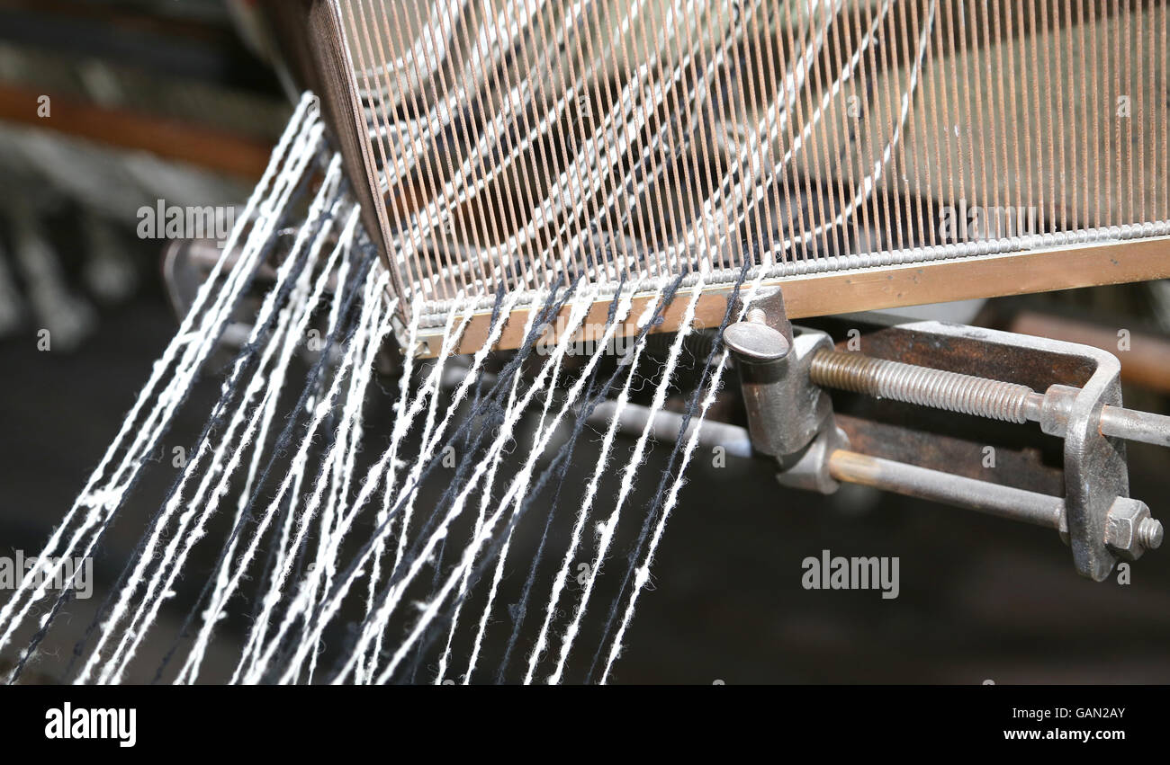 detail of ancient loom for the production of the fabrics in the textile ...