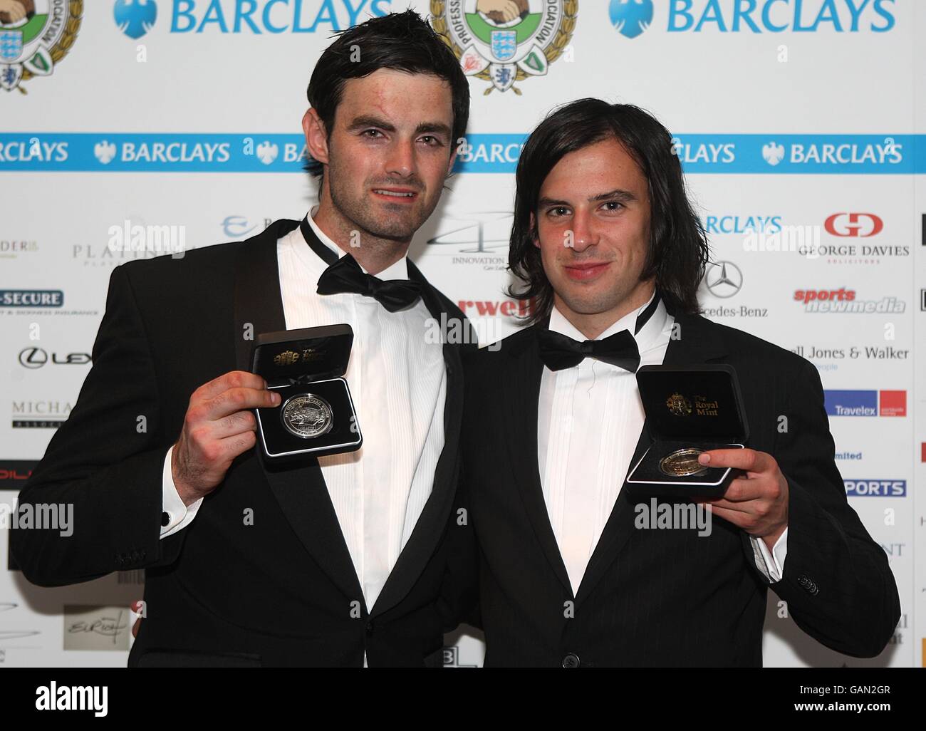 Peterborough United's George Boyd (r) and goalkeeper Joe Lewis with ...