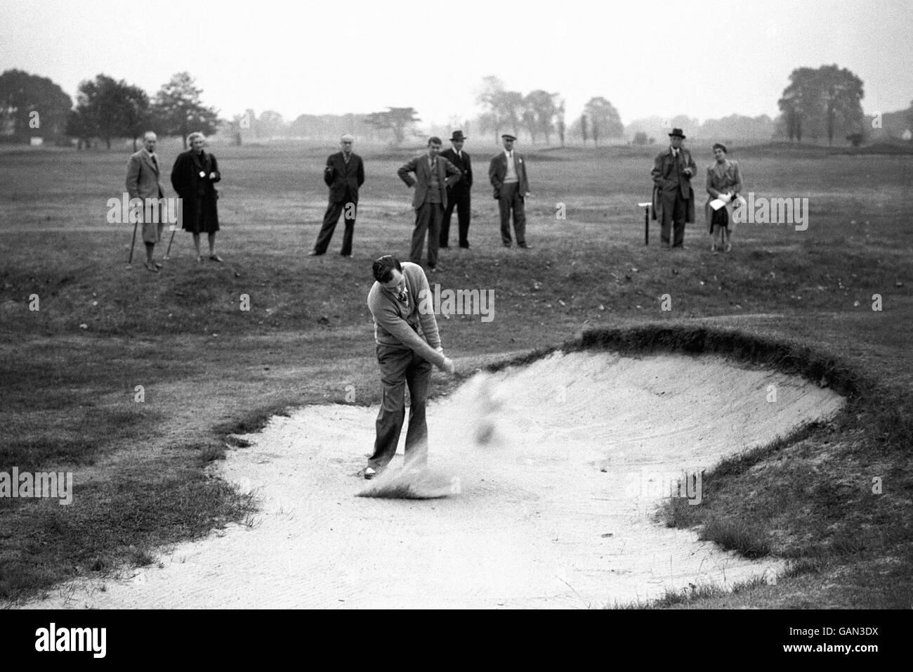 Fred Daly bunkered at the 8th when partnering Charlie Ward Stock Photo ...