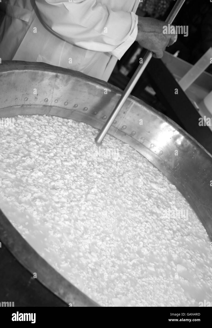 Curd mixing Black and White Stock Photos & Images - Alamy