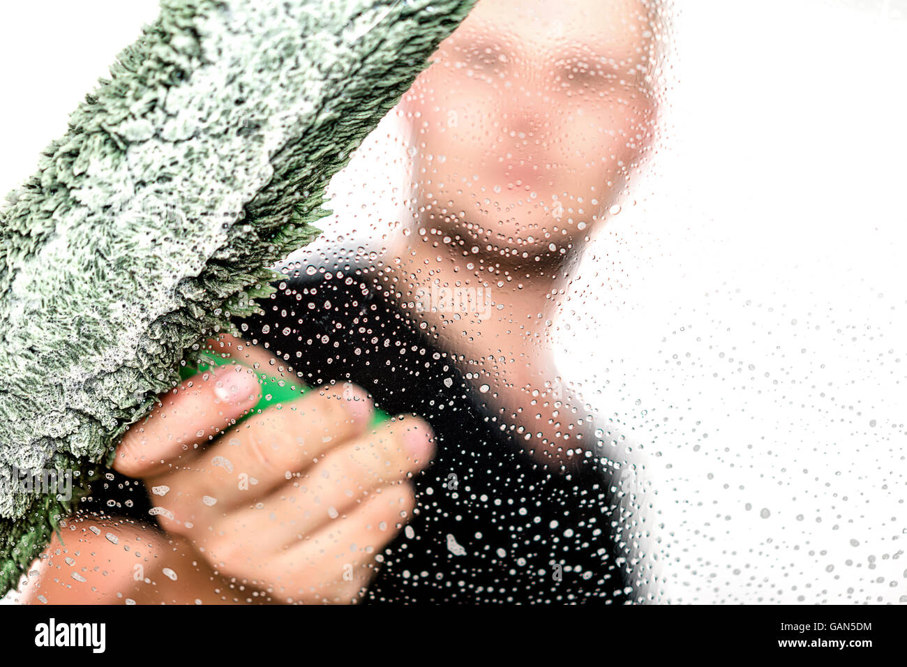 Male window cleaner behind a window (MR Stock Photo - Alamy