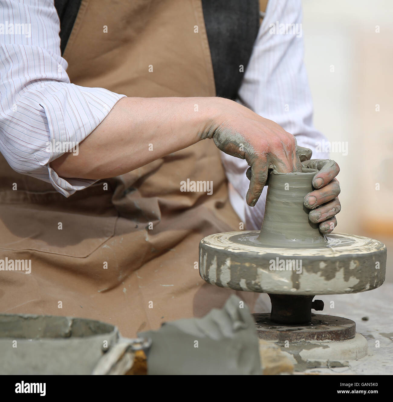 skilled craftsman potter shaping clay to make an handmade pot Stock ...