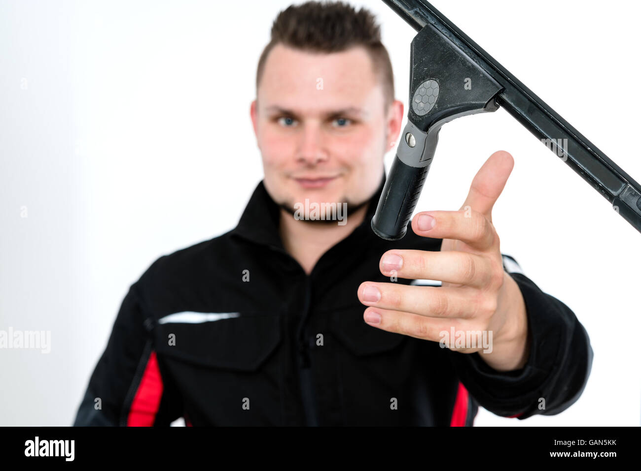 Male window cleaner and his flying cleaning wiper (MR Stock Photo - Alamy