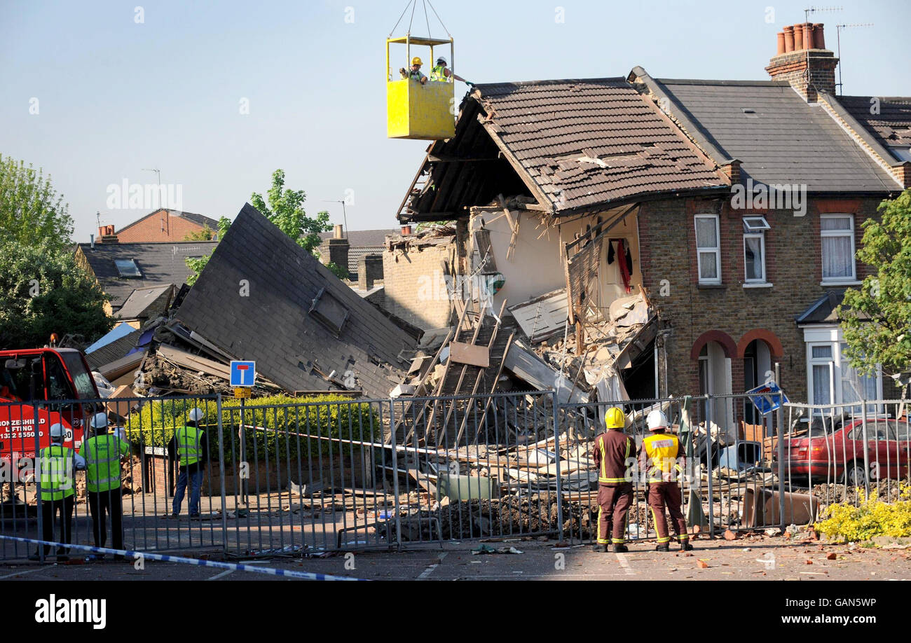 Fire crews at the scene of houses in Stanley Road, Harrow, north London ...
