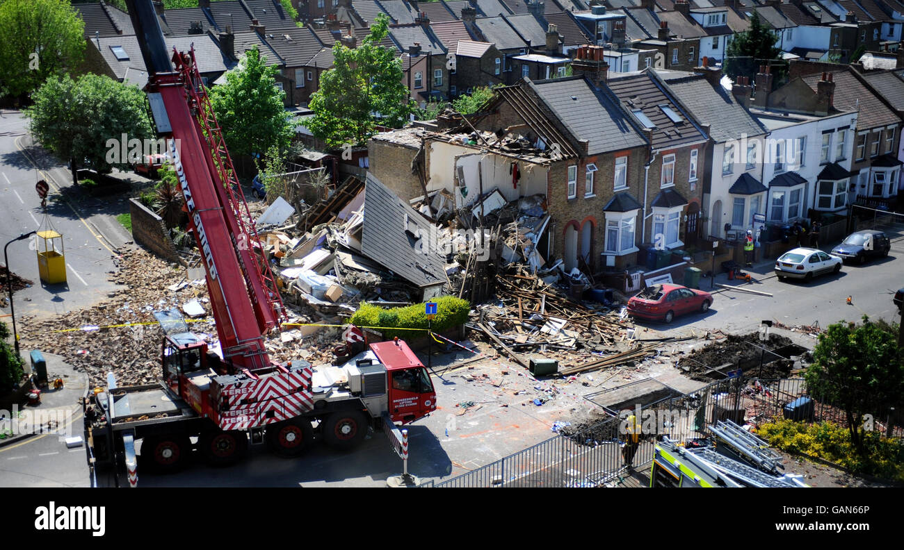 Fire crews at the scene of houses in Stanley Road, Harrow, north London ...