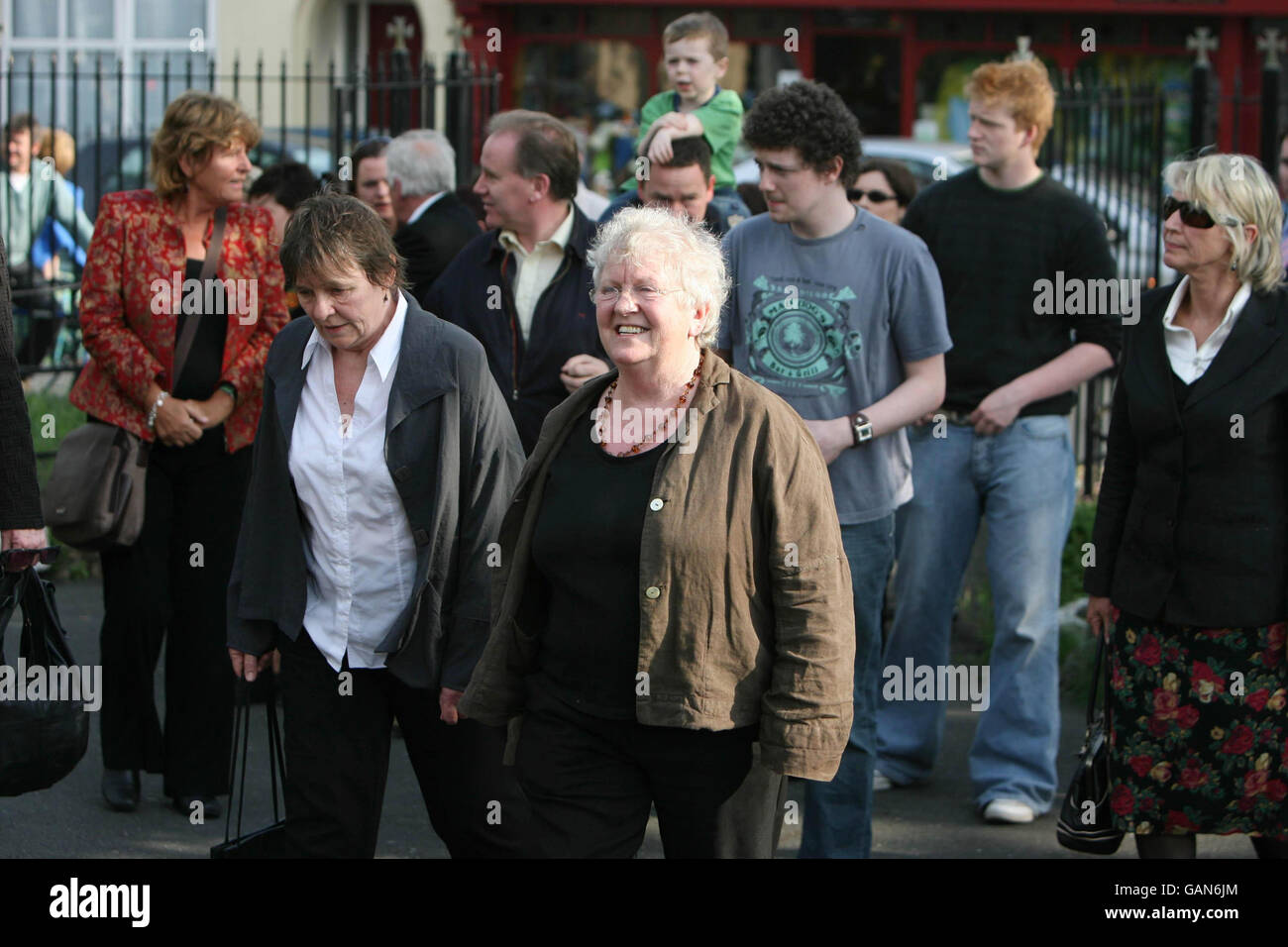Journalist and close friend Nell McCafferty (centre) attends the ...