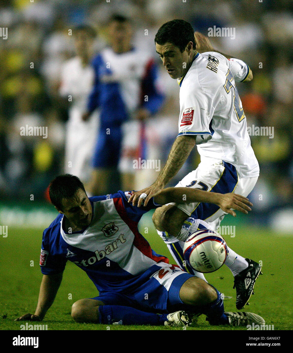 Leeds United's Andrew Hughes and Carlisle United's Evan Horwood during ...
