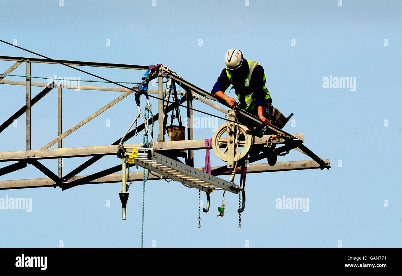 Maintenance work on Electricity pylons Stock Photo - Alamy