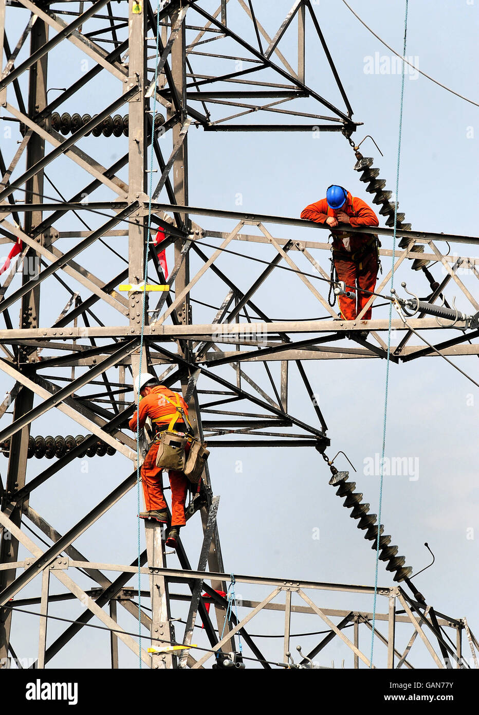 Maintenance work on Electricity pylons Stock Photo - Alamy