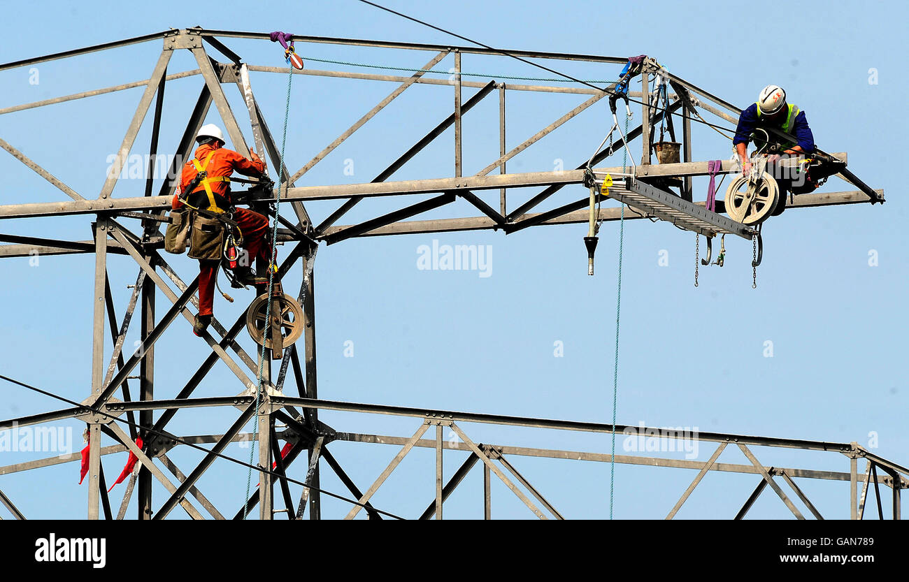 Maintenance work on Electricity pylons Stock Photo - Alamy