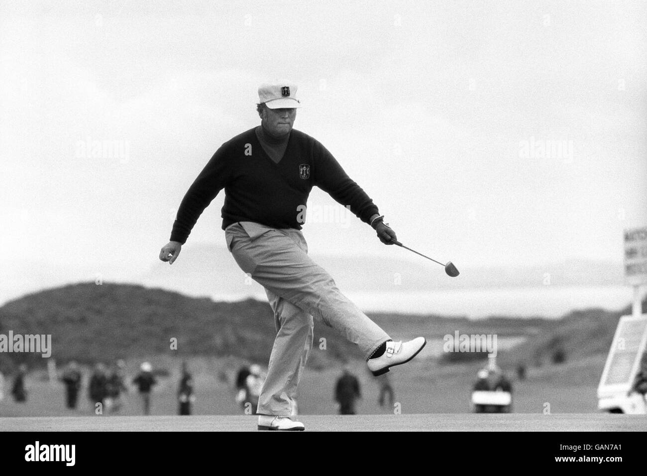 Billy Casper of the United States dances with delight after sinking a ...