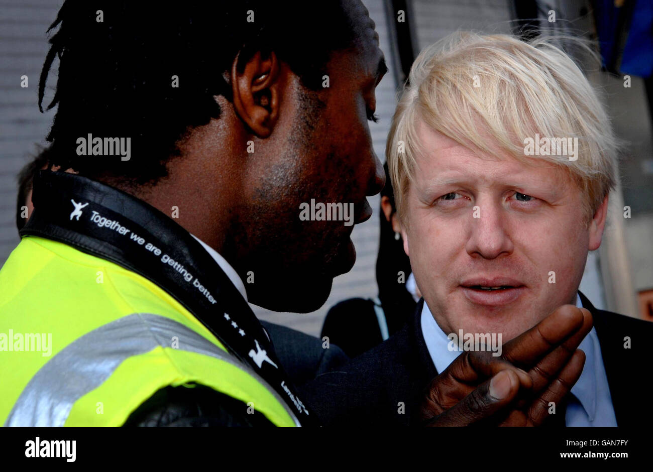 London Mayor Boris Johnson talks to a local man on a walkabout in ...