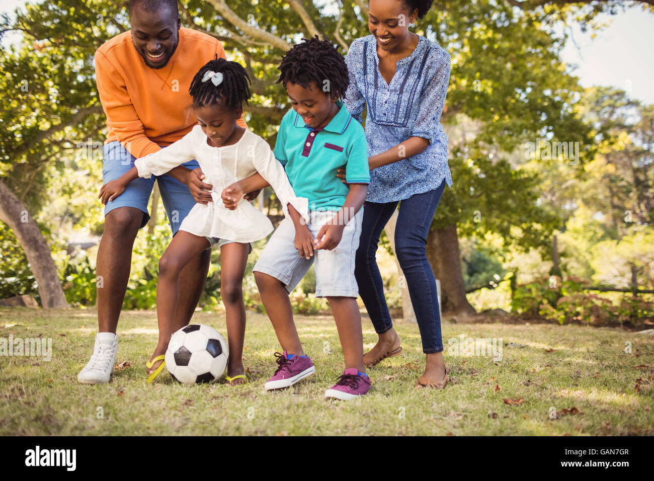 Happy family having fun Stock Photo - Alamy