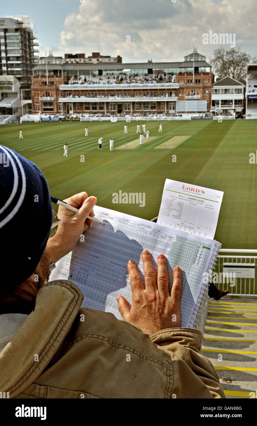 A spectator marks scorecard champion county match lords cricket ground ...