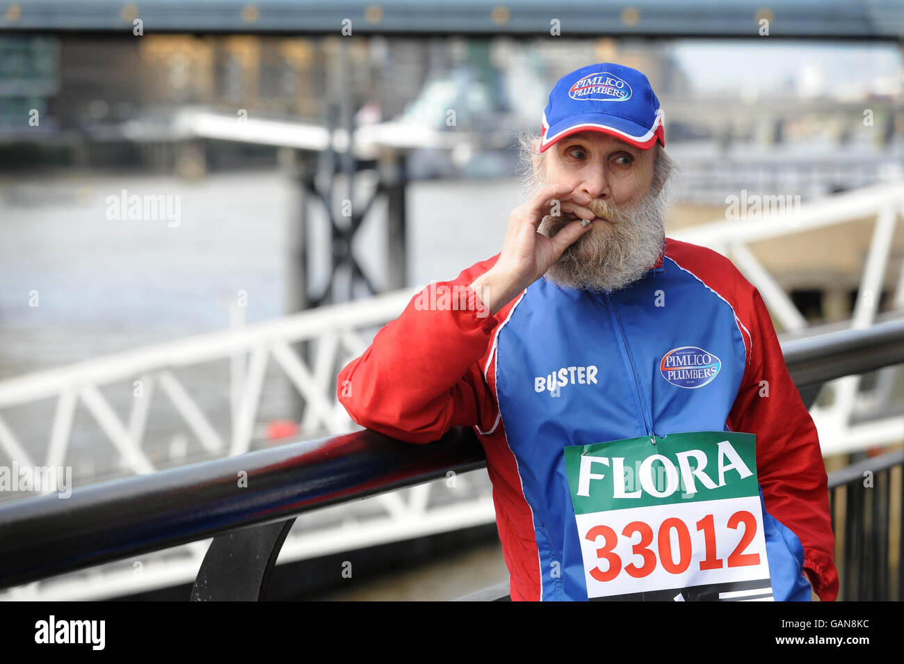 101-year-old Buster Martin has a cigarette during a photocall ahead of ...