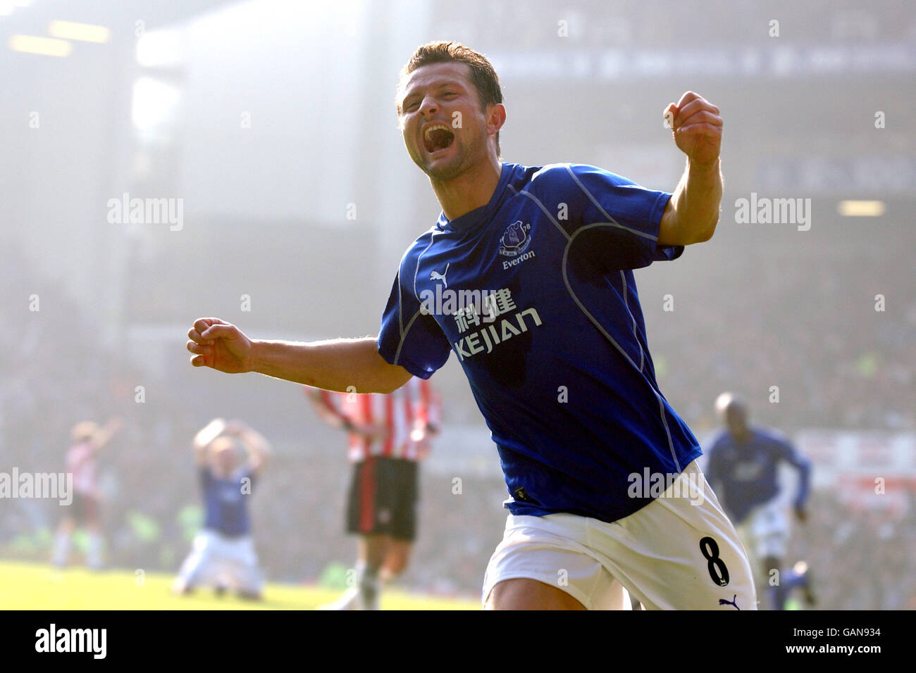 Tomasz Radzinski of Everton celebrates after scoring the winning goal a ...