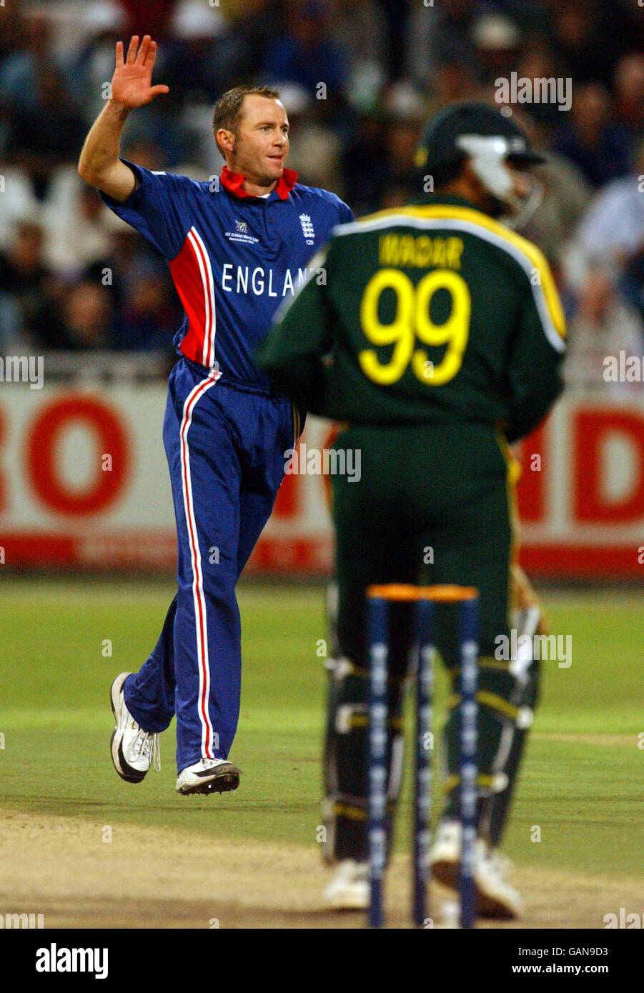 England's Craig White celebrates his wicket of Pakistan's captain Waqar ...