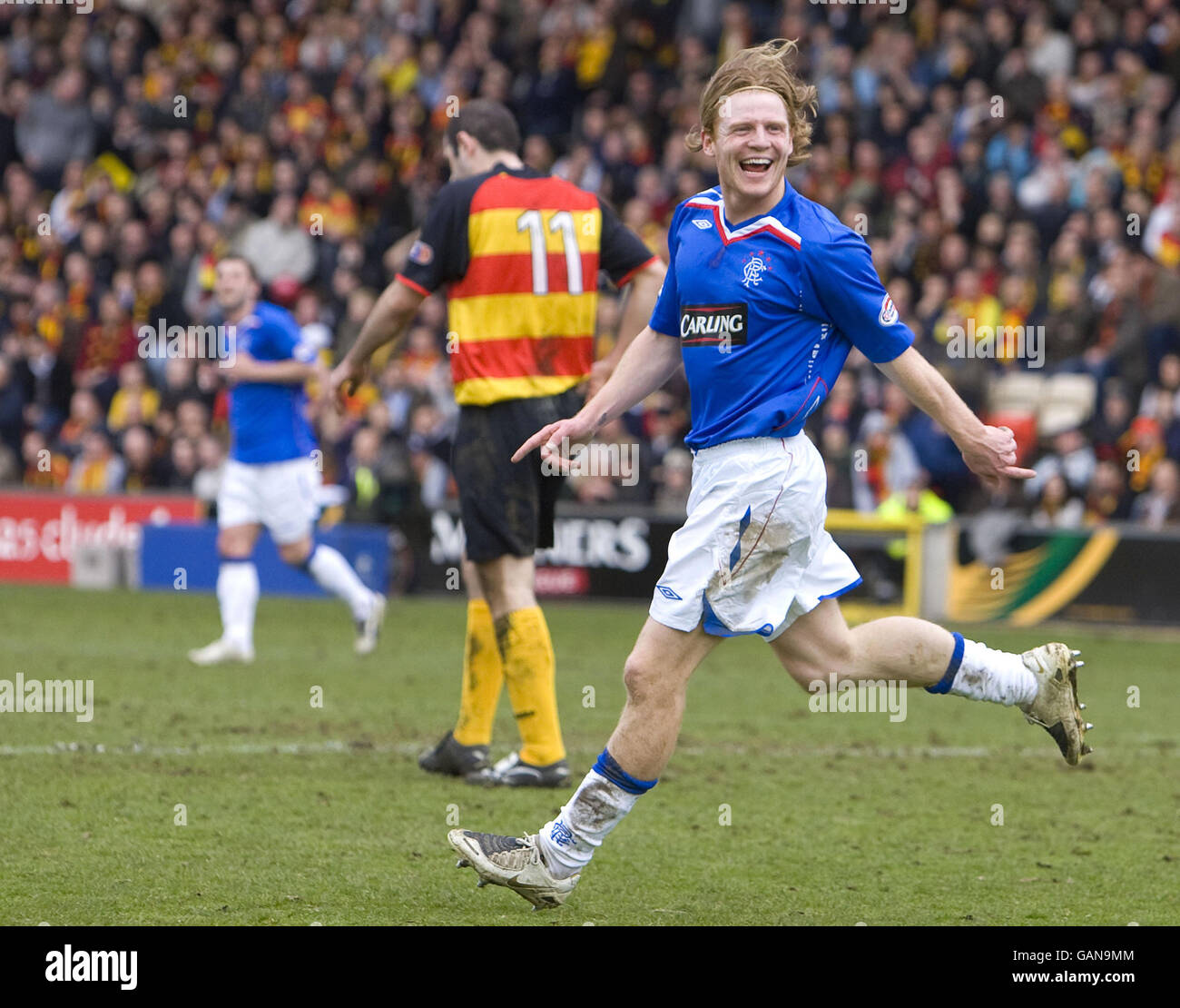 Rangers' Chris Burke scores his sides second goal against Partick ...