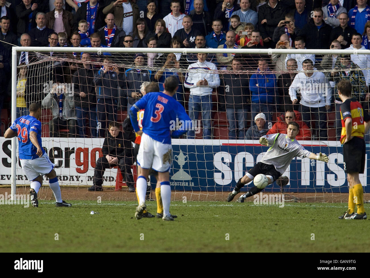 Rangers' Daniel Cousin has his penalty saved by Partick Thistle's ...