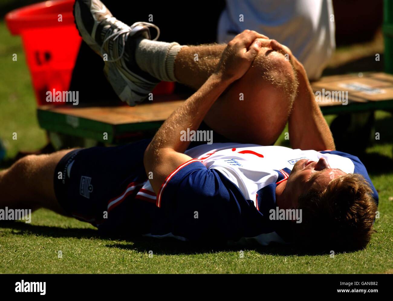 Englands nick knight stretches his injured calf hi-res stock ...