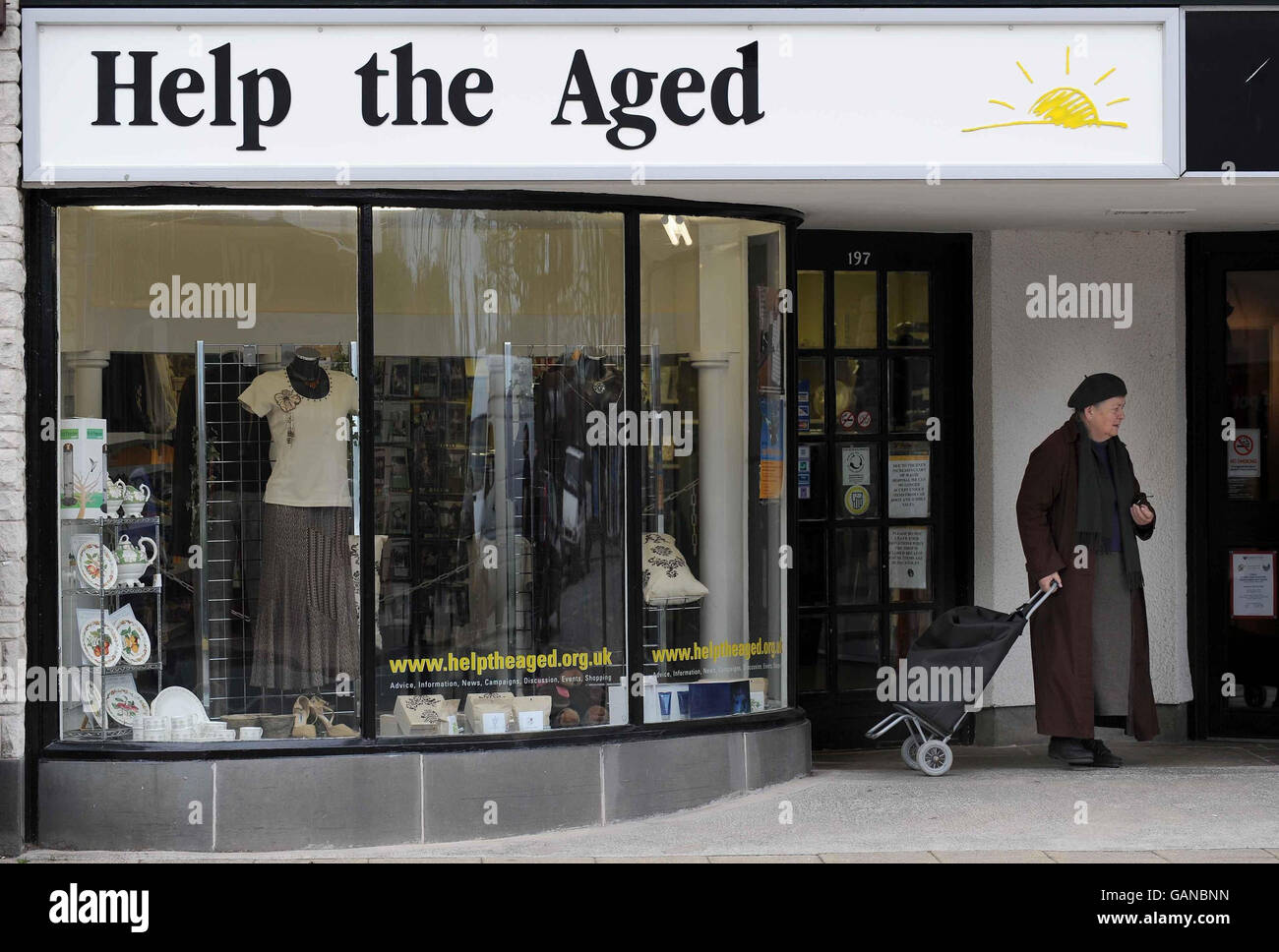 Sign stock. A Help the Aged branch in Hale, Altrincham Stock Photo - Alamy