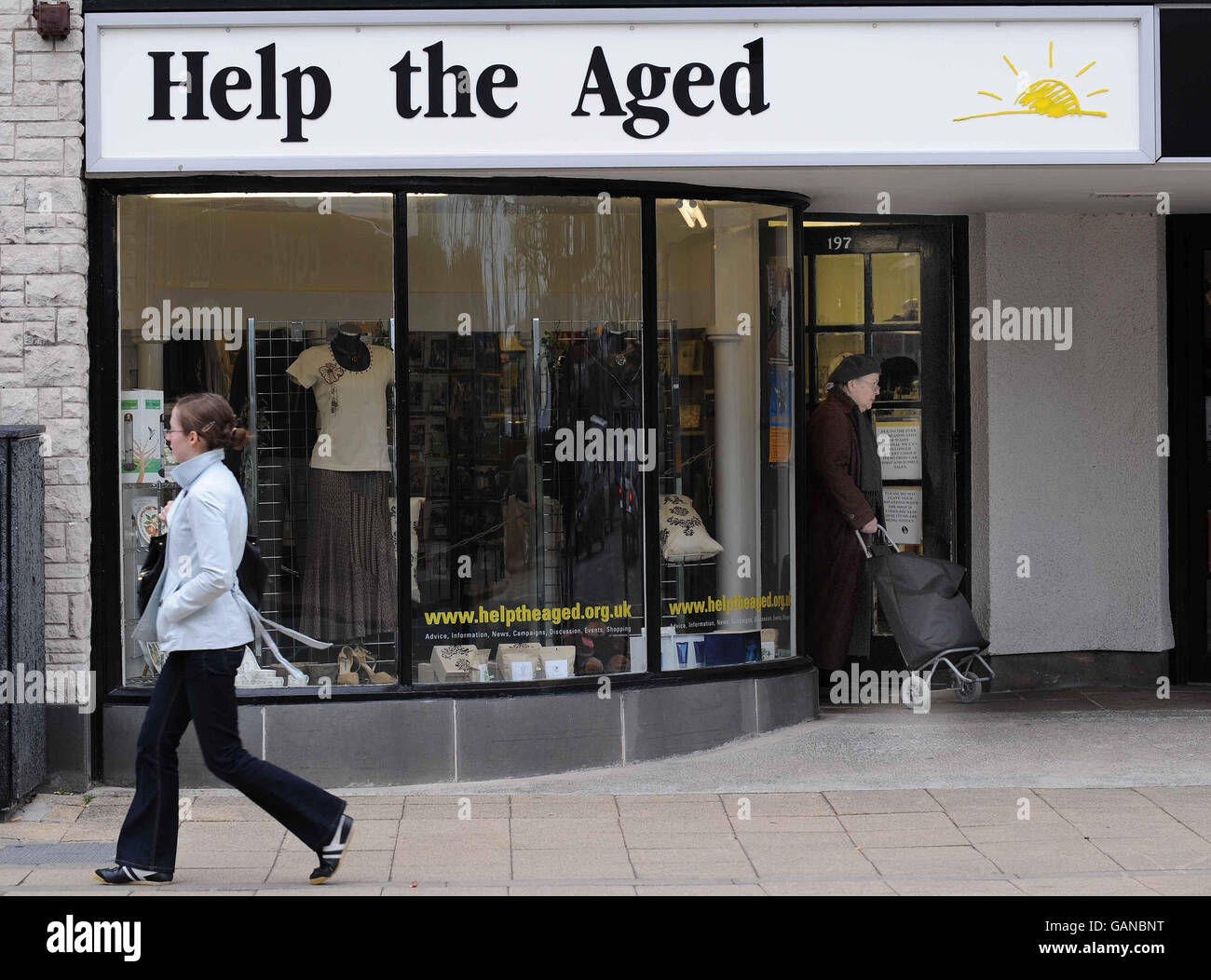 Sign stock. A Help the Aged branch in Hale, Altrincham Stock Photo - Alamy