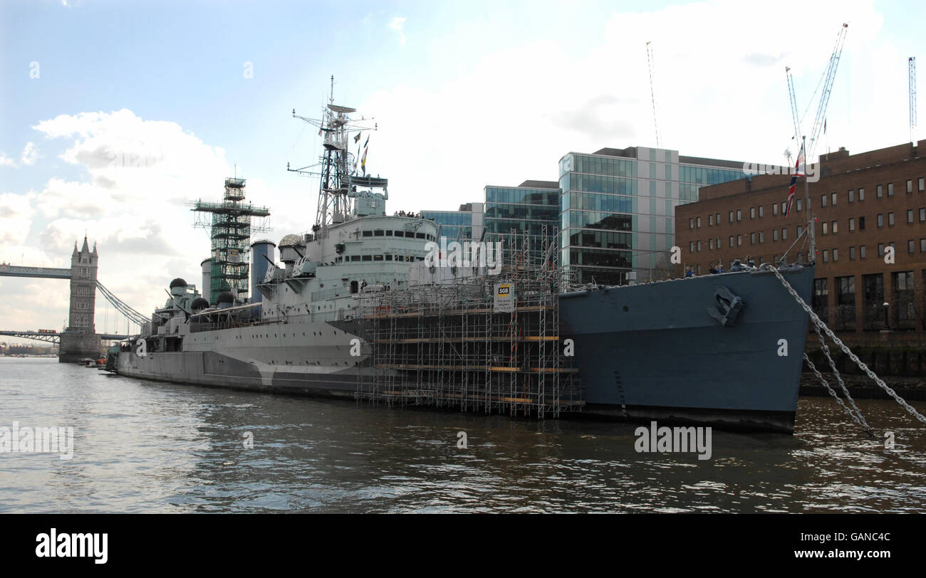HMS Belfast on the River Thames with scaffolding around her hull Stock ...