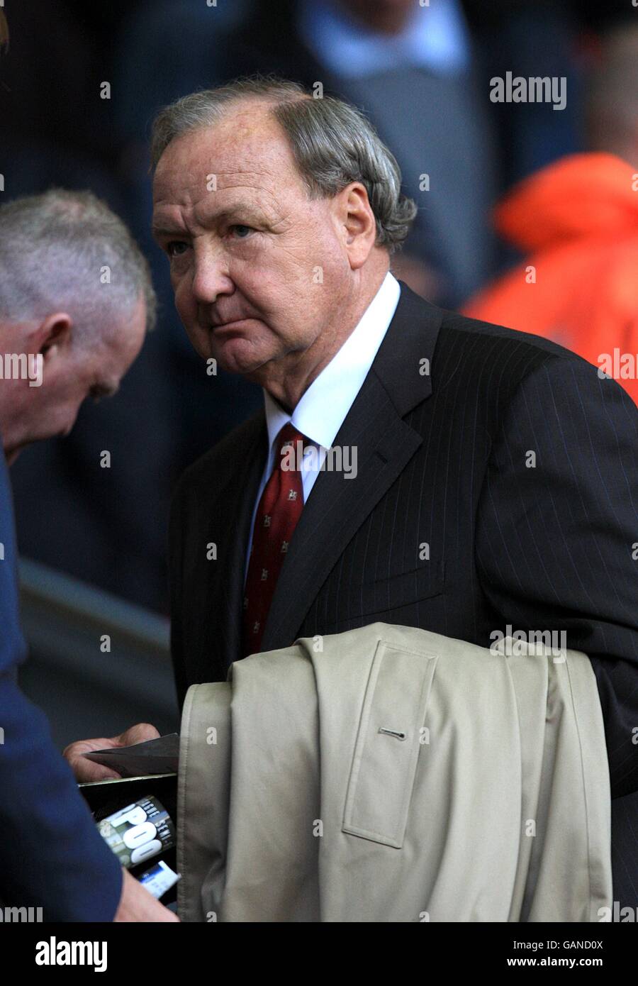 Liverpool co-owner Tom Hicks takes his seat in the stands prior to kick ...