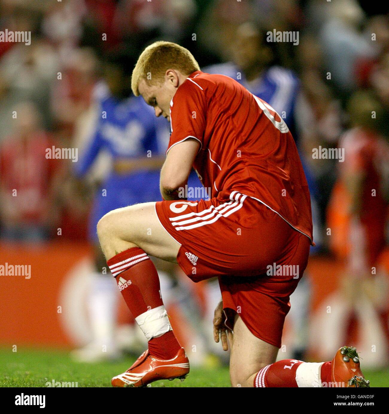 Liverpools john arne riise after scoring a late own goal hi-res stock ...