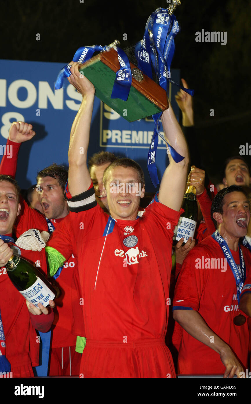Aldershot towns captain rhys day lifts the trophy hi-res stock ...