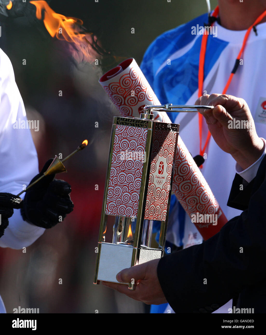 BOCOG Executive Vice-President Jiang Xiaoya presents the flame to light ...