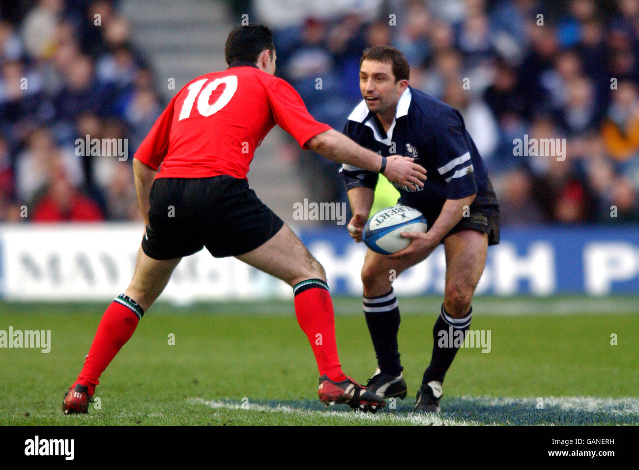 Scotland's Bryan Redpath (r) and Wales' Stephen Jones (l) battle for ...
