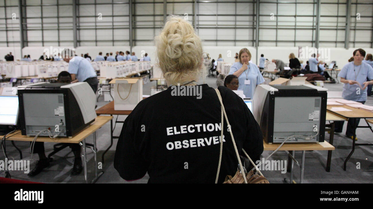 An election observer at the Excel Centre in east London where votes ...