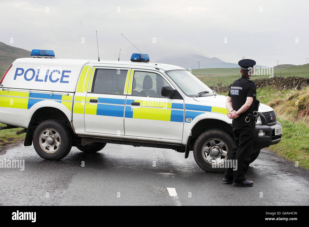 A police car blocks hi-res stock photography and images - Alamy