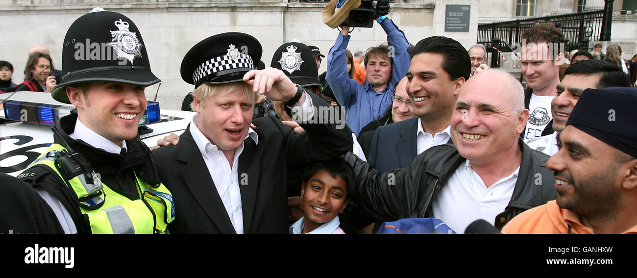 Newly elected London Mayor Boris Johnson wears a policeman's hat in ...