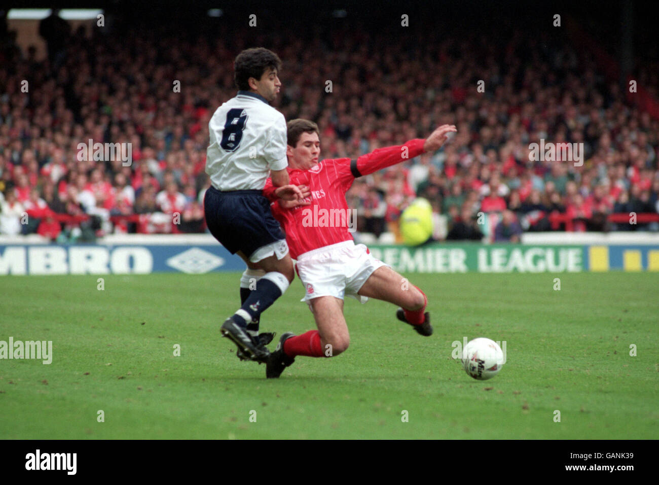 Nottingham Forest's Nigel Clough slides into Tottenham Hotspur Nayim ...