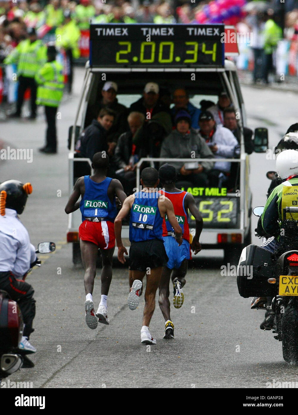 Martin Lel (left) leads as the Elite Men make their way along the ...