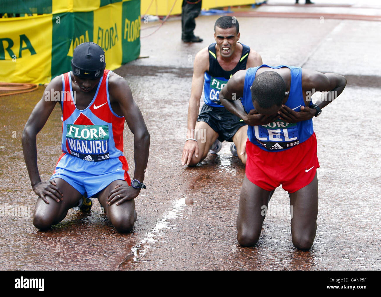 Martin Lel (left) from Kenya wins the Elite mens race during the Flora ...