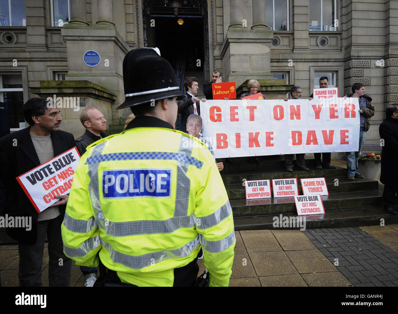 Labour Party supporters hold banners outside Dewsbury Town Hall as ...