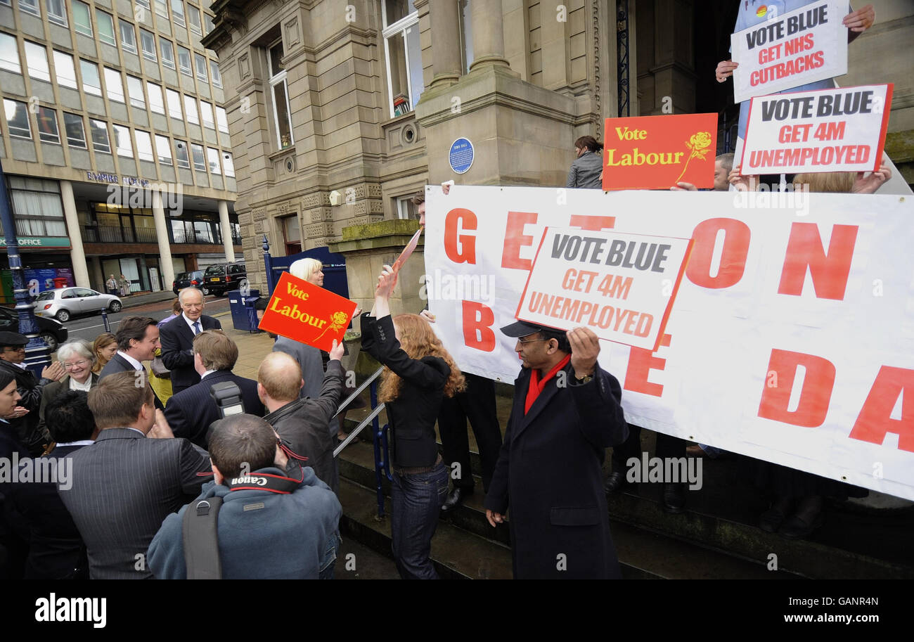 Labour Party supporters hold banners outside Dewsbury Town Hall as ...
