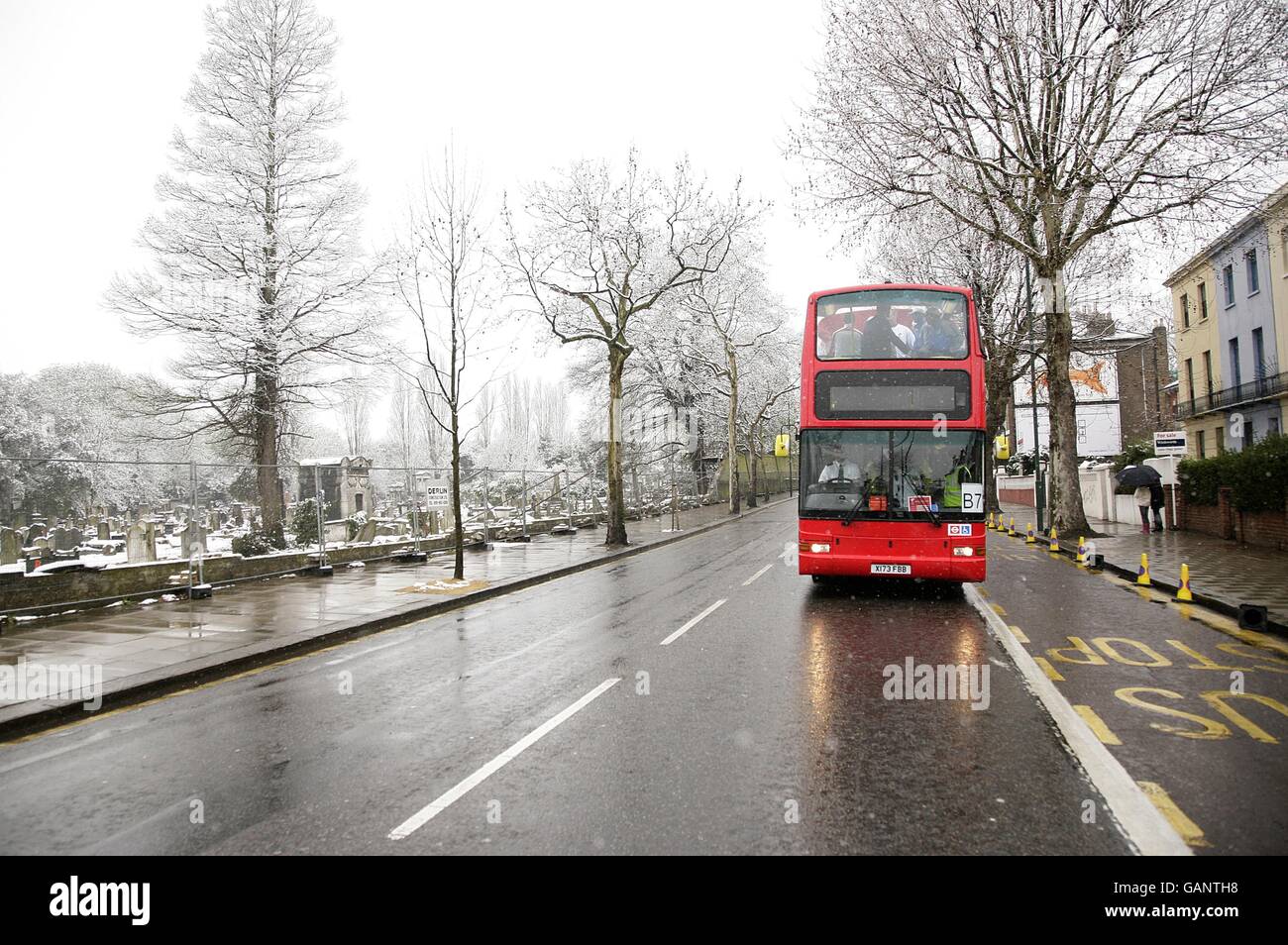 The Olympic bus nears Ladbroke Grove during the Beijing Olympics torch ...