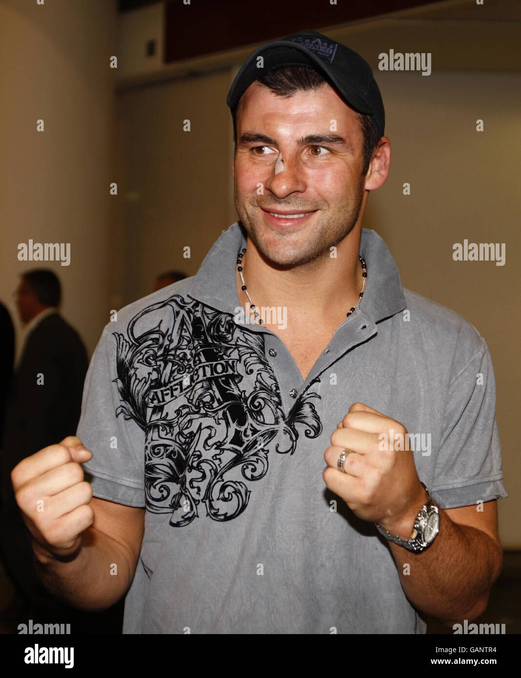 Champion boxer Calzaghe returns. Boxer Joe Calzaghe arrives back at ...