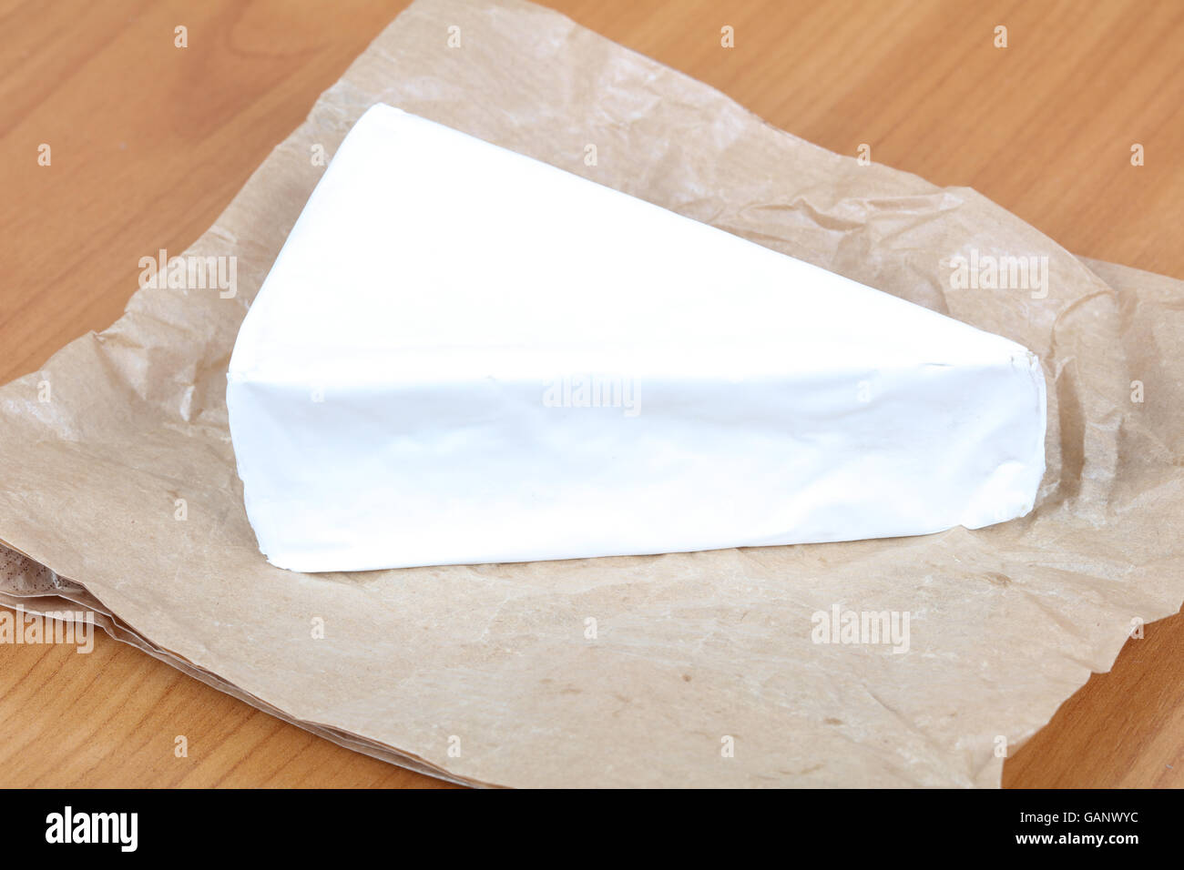 Brie cheese segment - ready for eat Stock Photo - Alamy