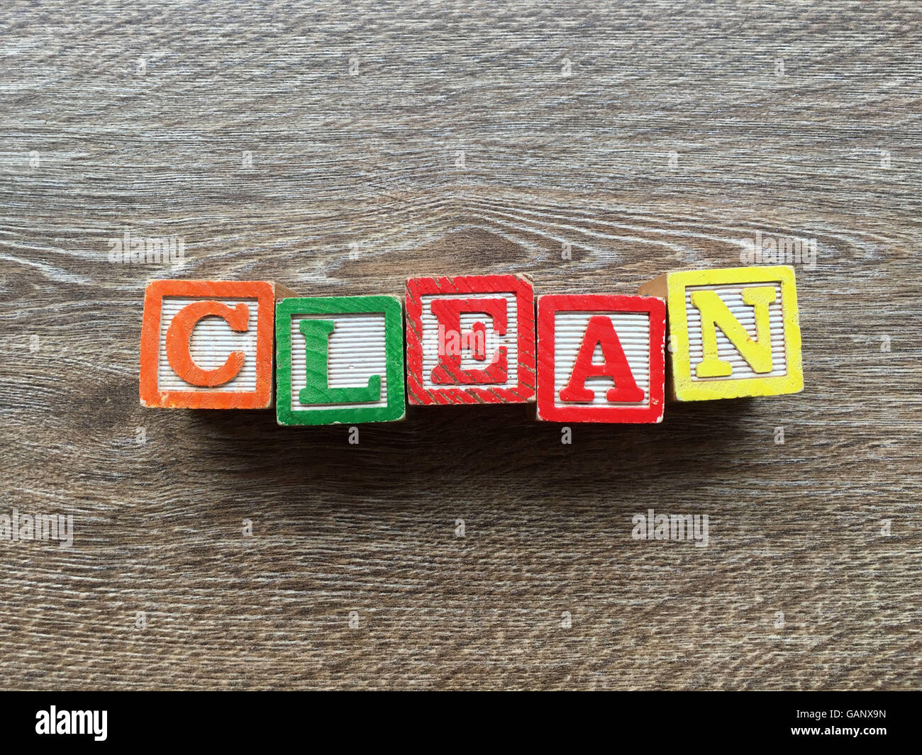 CLEAN word made with toy wood blocks letters Stock Photo - Alamy
