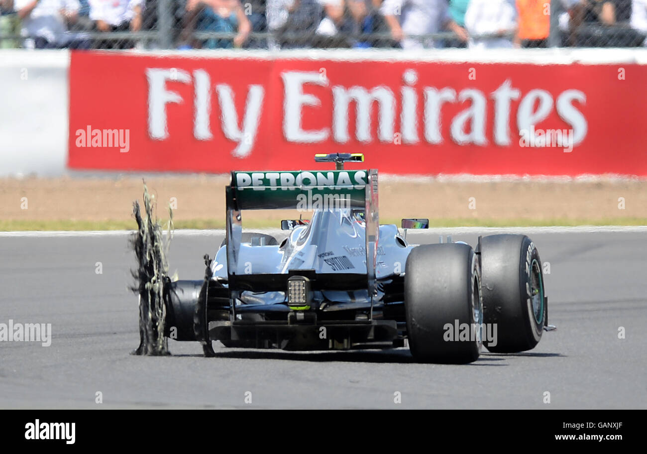 File photo dated 30-06-2013 of Mercedes' Lewis Hamilton with a burst ...