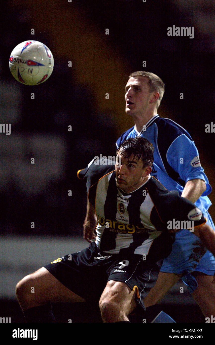 Notts County's Mark Stallard (l) blocks Port Vale's Peter Clarke (r ...