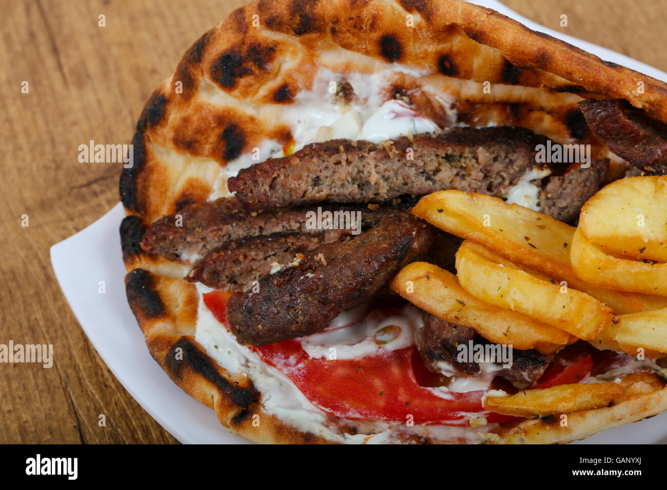 Gyros - tradition Greek cuisine - pork with pita, potato and sauce ...