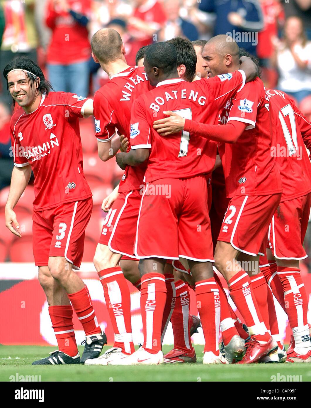 Middlesbrough players celebrate Chris Riggott (not in picture) scoring ...