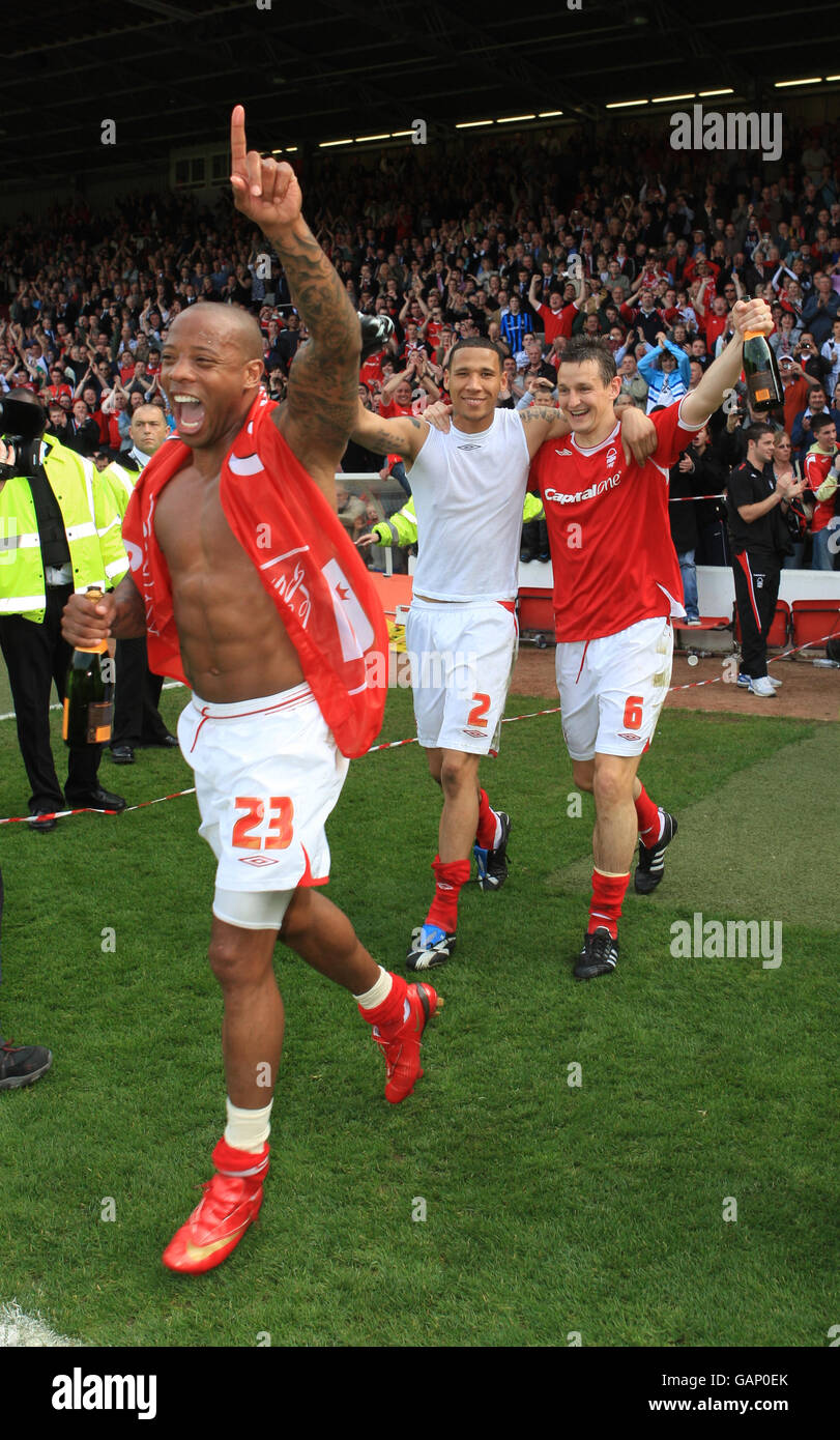 Nottingham Forest's captain Kelvin Wilson celebrates with teammate Ian ...