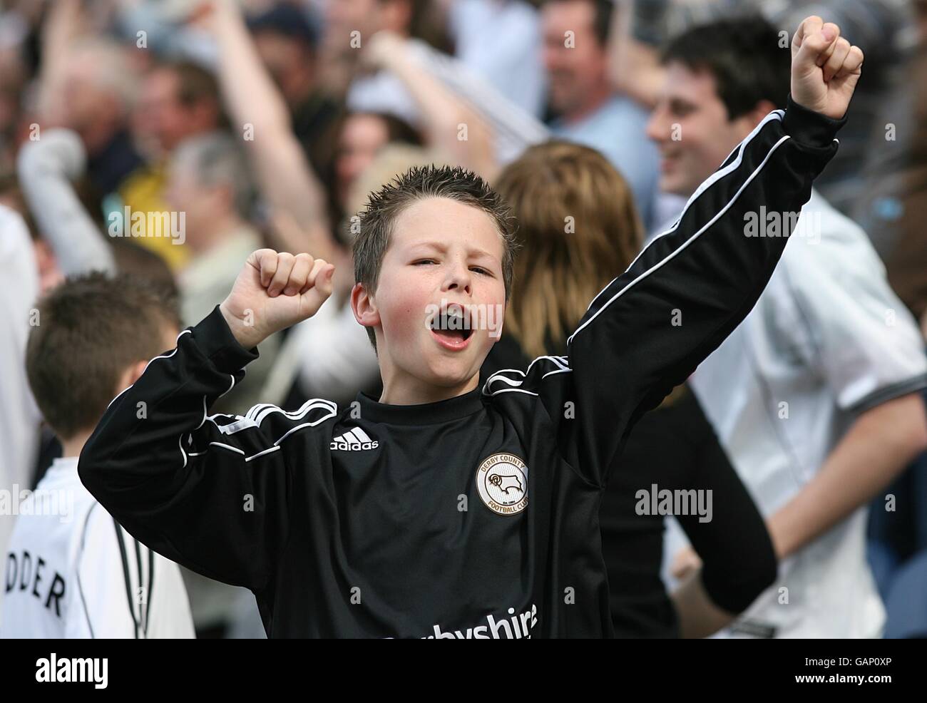 A derby county fan celebrates in the stands hi-res stock photography ...